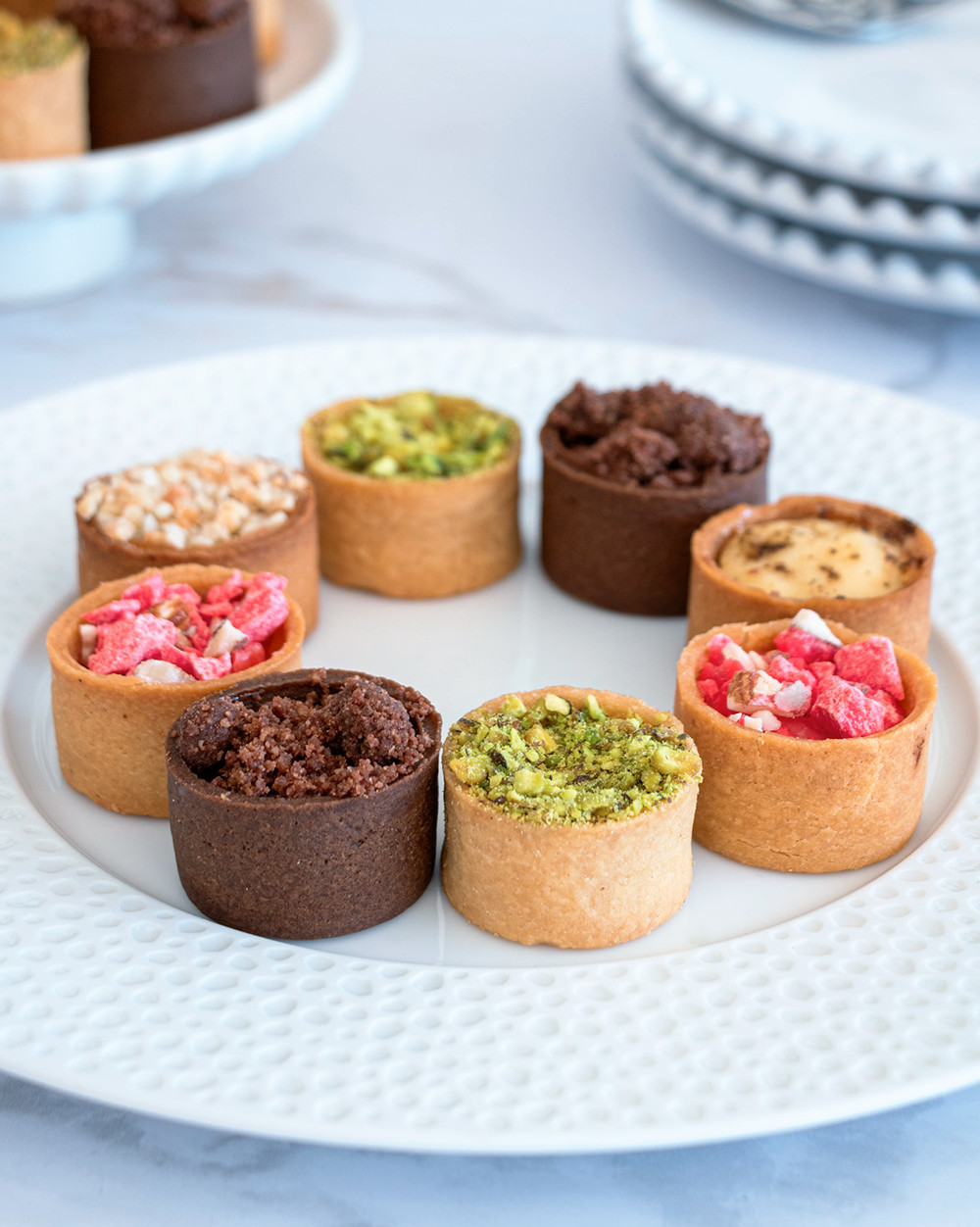 Assortiment 14 mini flans – Chocolat pistache praline Lyon